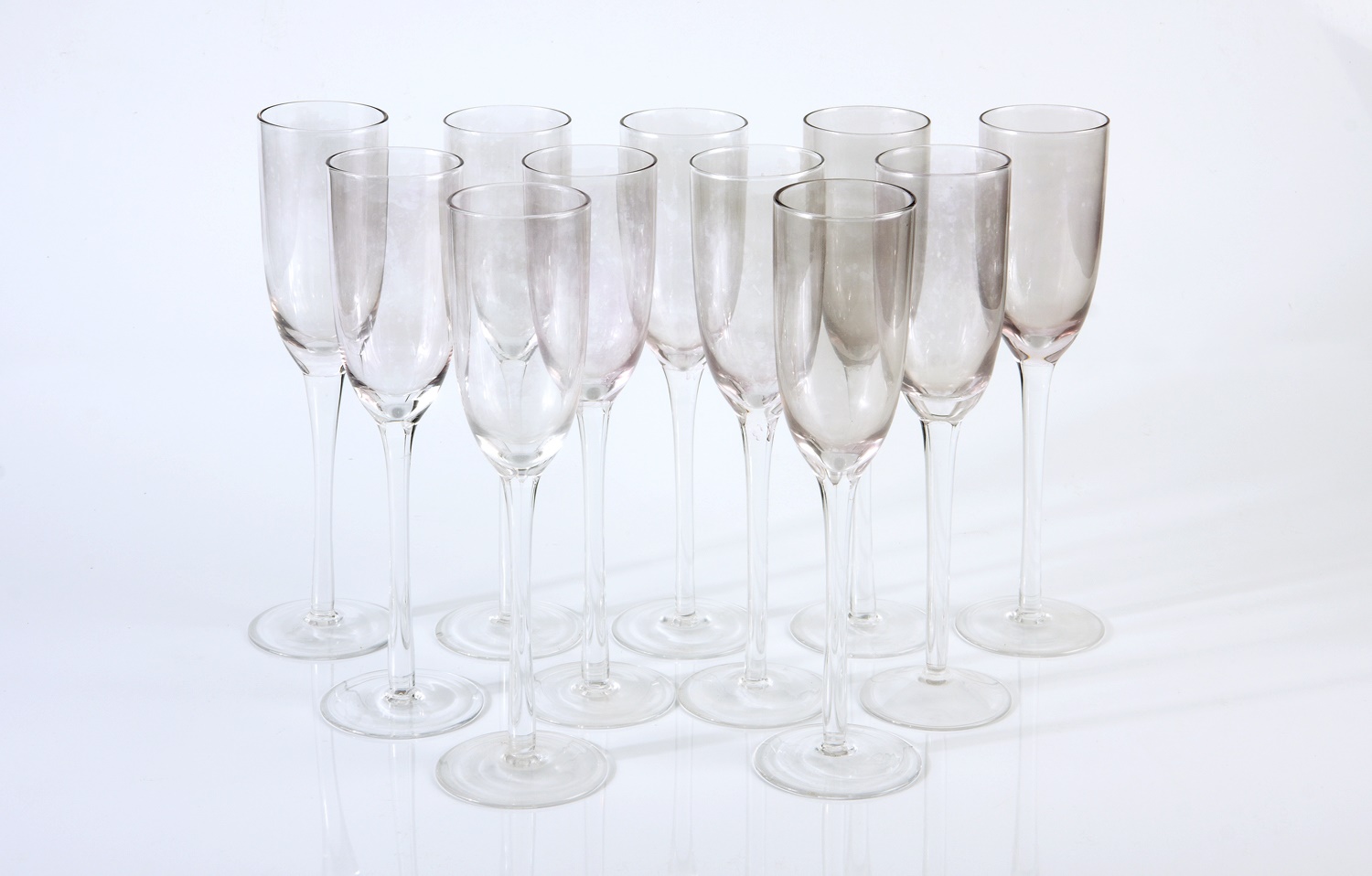Lot 140 Eleven Coloured Glass Flutes